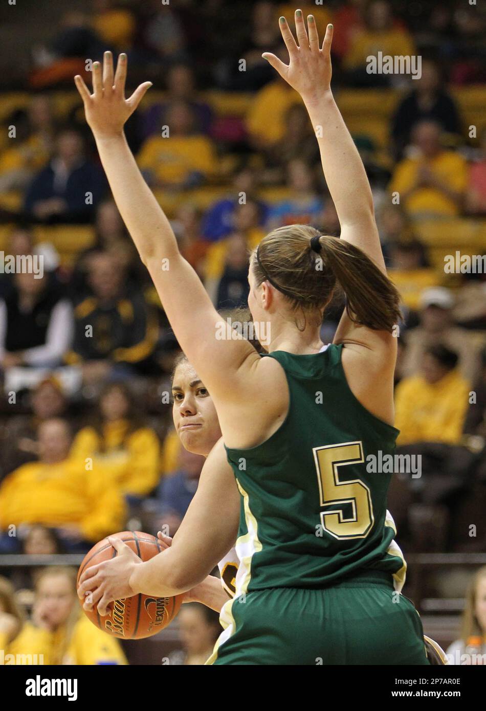 Wyoming guard Aubrey Vandiver looks to make a pass around Colorado ...