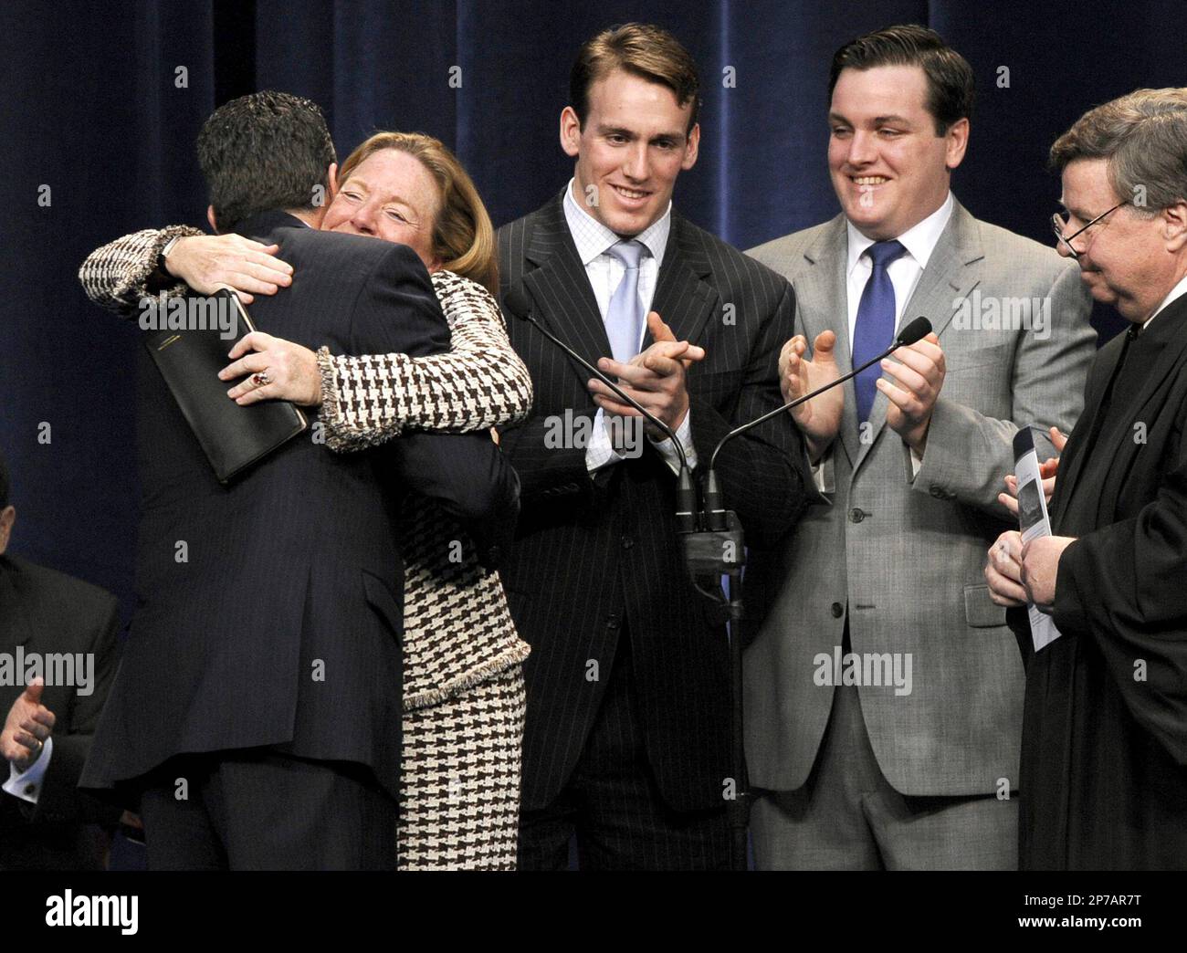 Dan Malloy, left, gets a hug from his wife Cathy after being sworn in as Connecticut's 88th ...