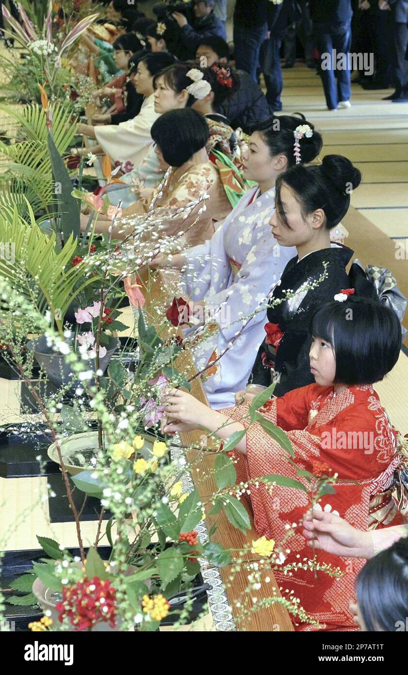 Ikenobo-style ikebana apprentices demonstrate New Year's first flower ...
