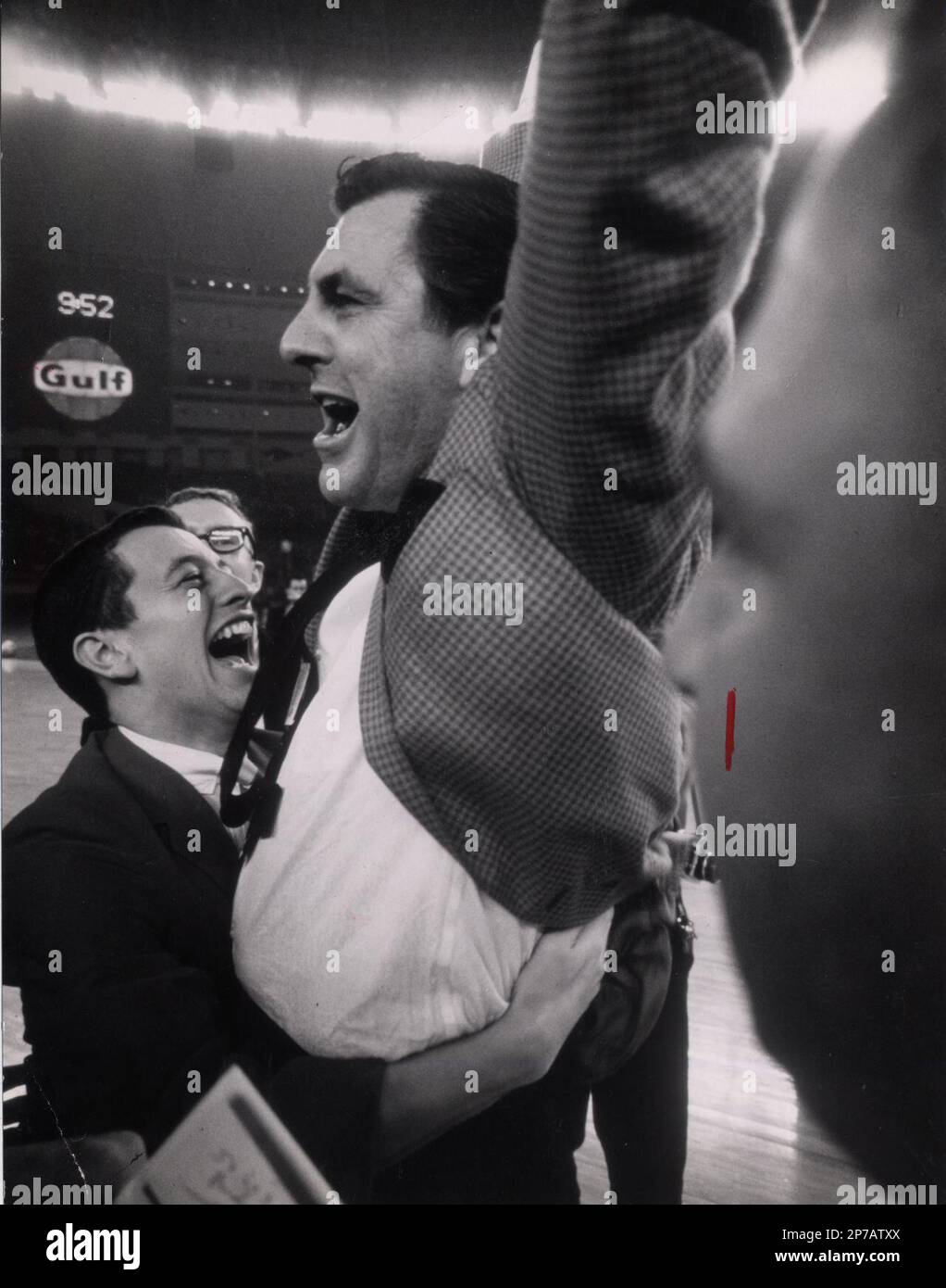 University of Houston coach Guy V. Lewis celebrates after 79-61 win at ...