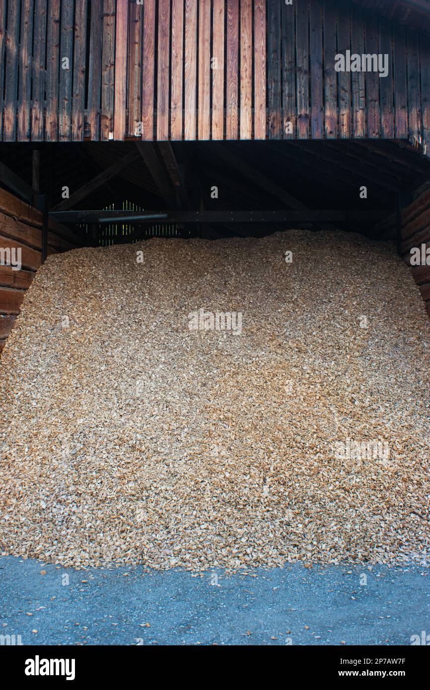 Large and tall pile of wooden saw dust in a barn, no people Stock Photo ...