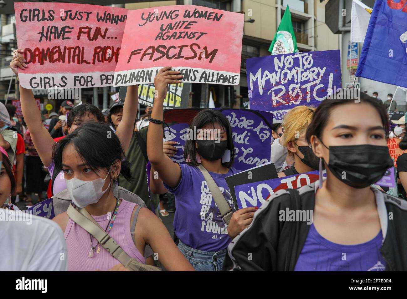 Manila, Philippines. 8th Mar, 2023. Protesters hold signs during a ...