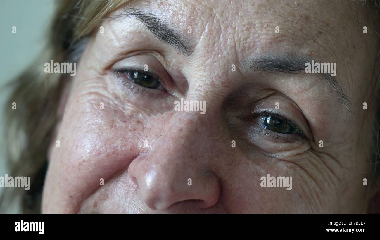One happy senior woman macro eyes close up smiling at camera. Mature ...