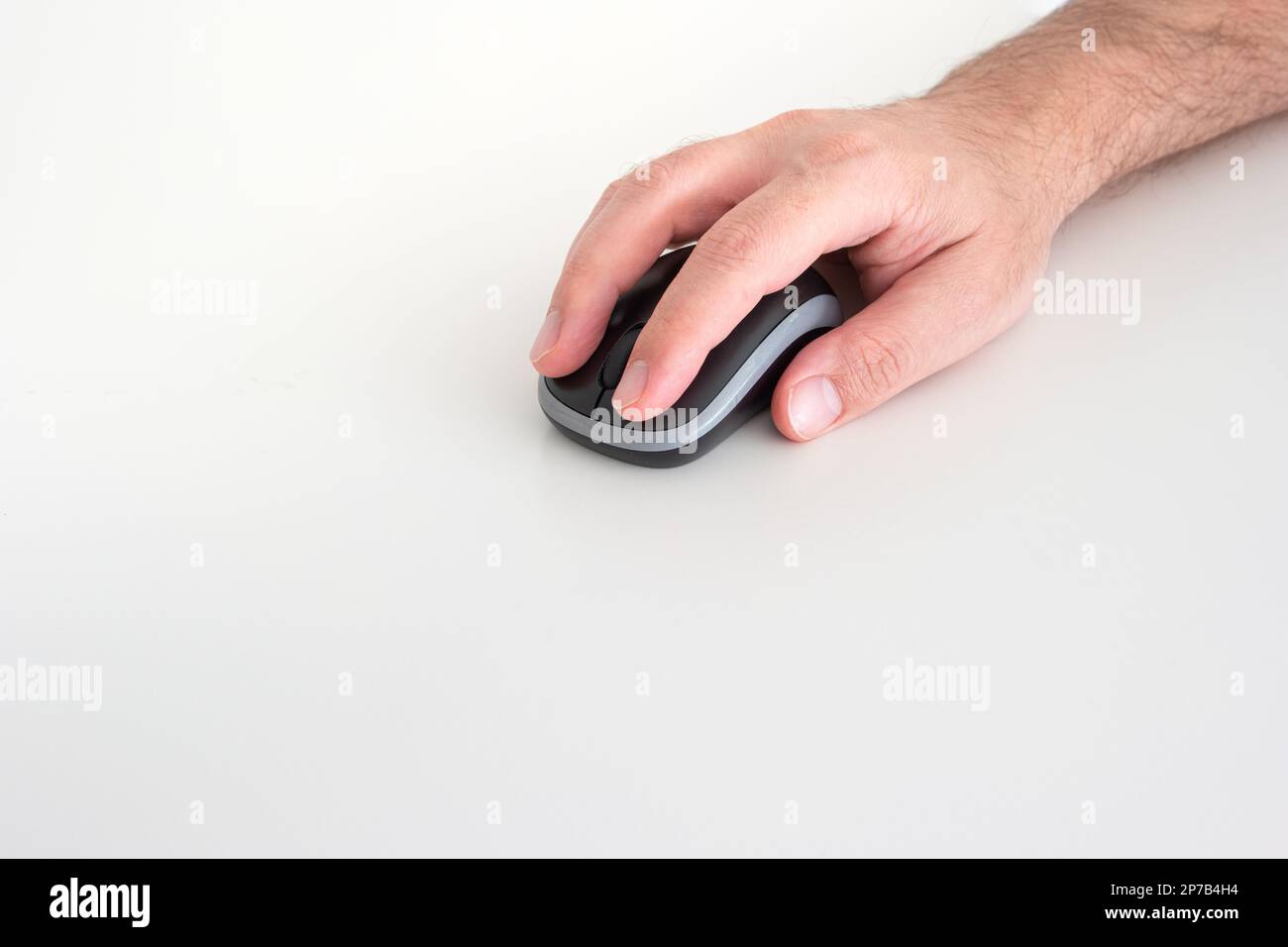 Hand holding wireless mouse hi-res stock photography and images - Alamy