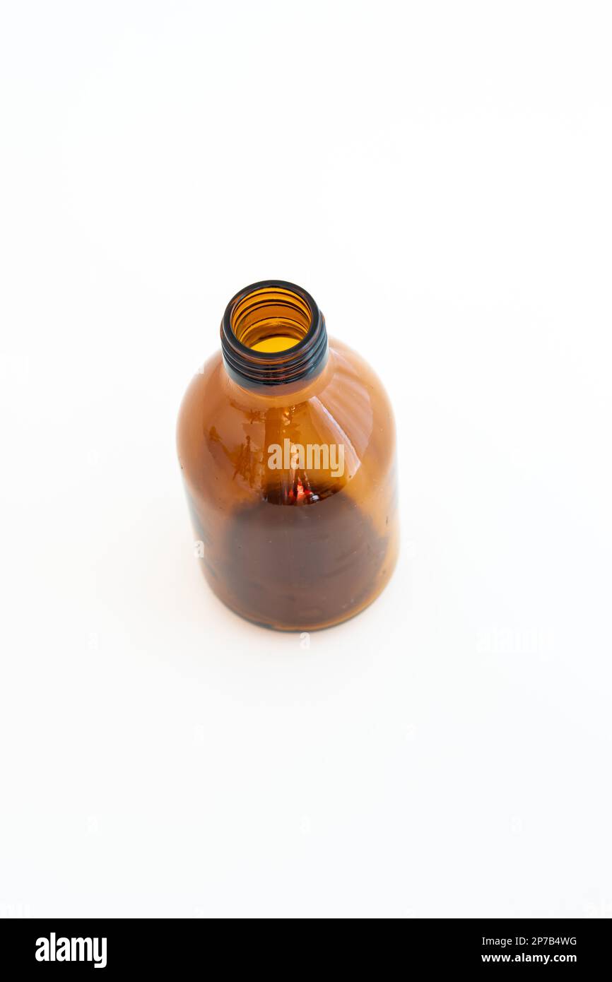 Brown empty glass bottle. Pharmaceutical syrup bottle, close up studio ...