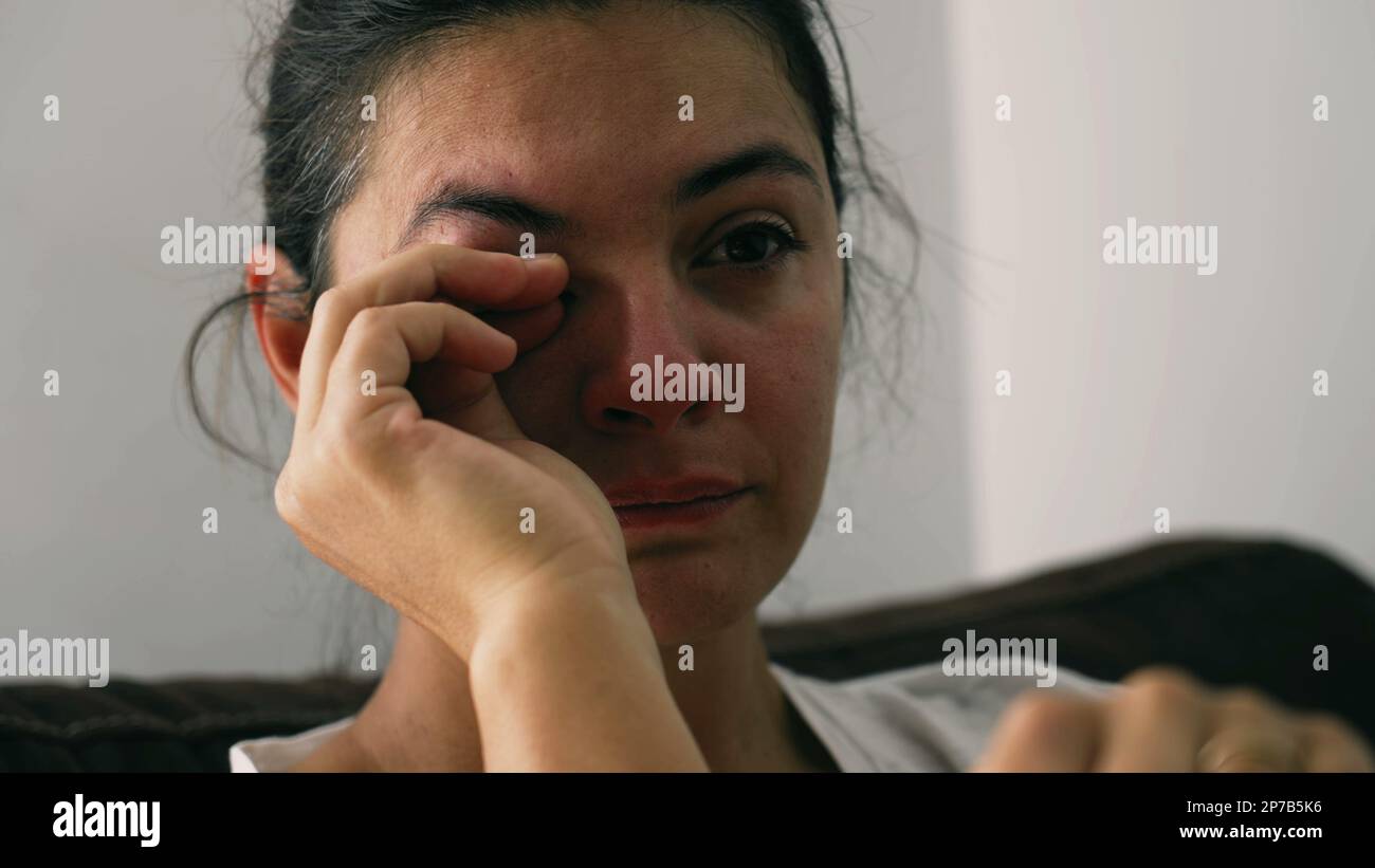 One depressed woman feeling anxiety. Portrait of a pensive sad person ...
