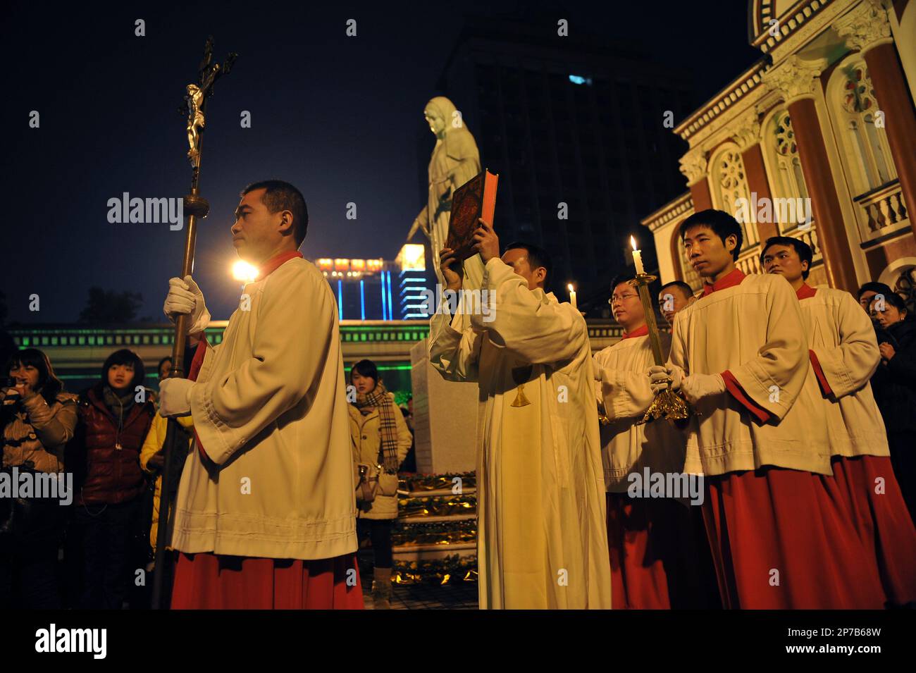 Catholics and priests attend the Christmas mass at a Catholic church on ...