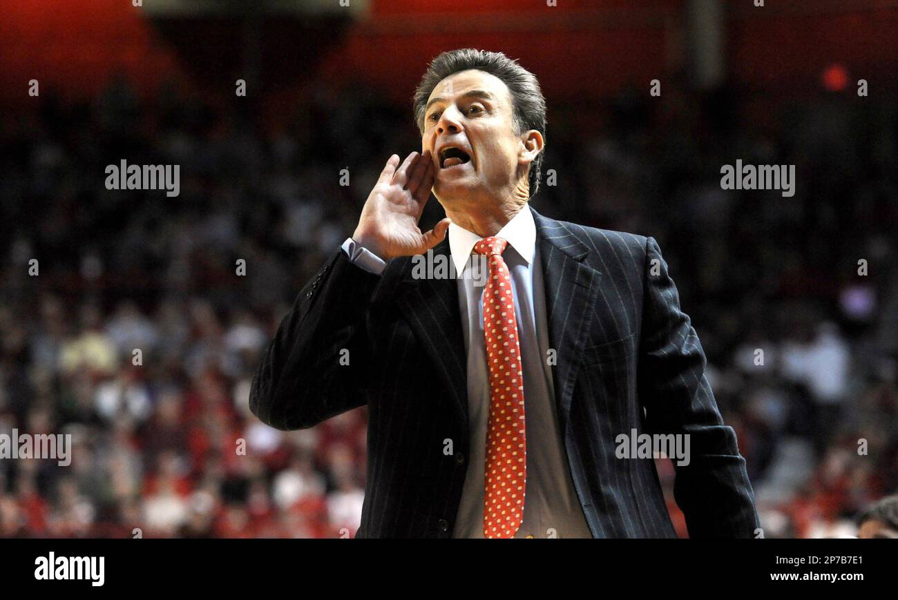 Louisville coach Rick Pitino yells to his team during the first half of ...