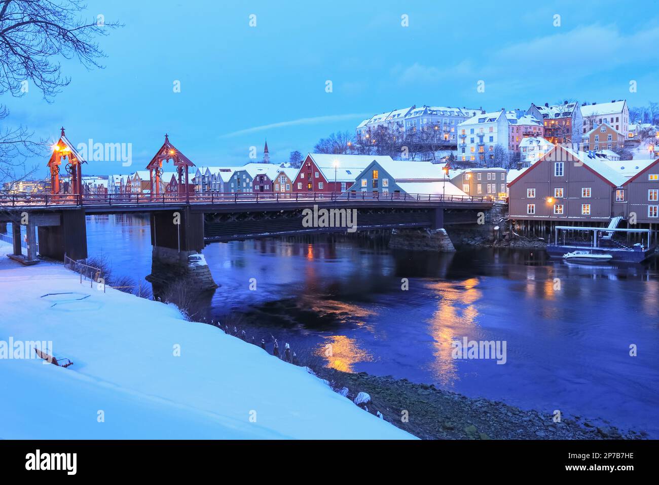 Twilight in Trondheim, spring snowfall, view of the Old Bridge ( den ...