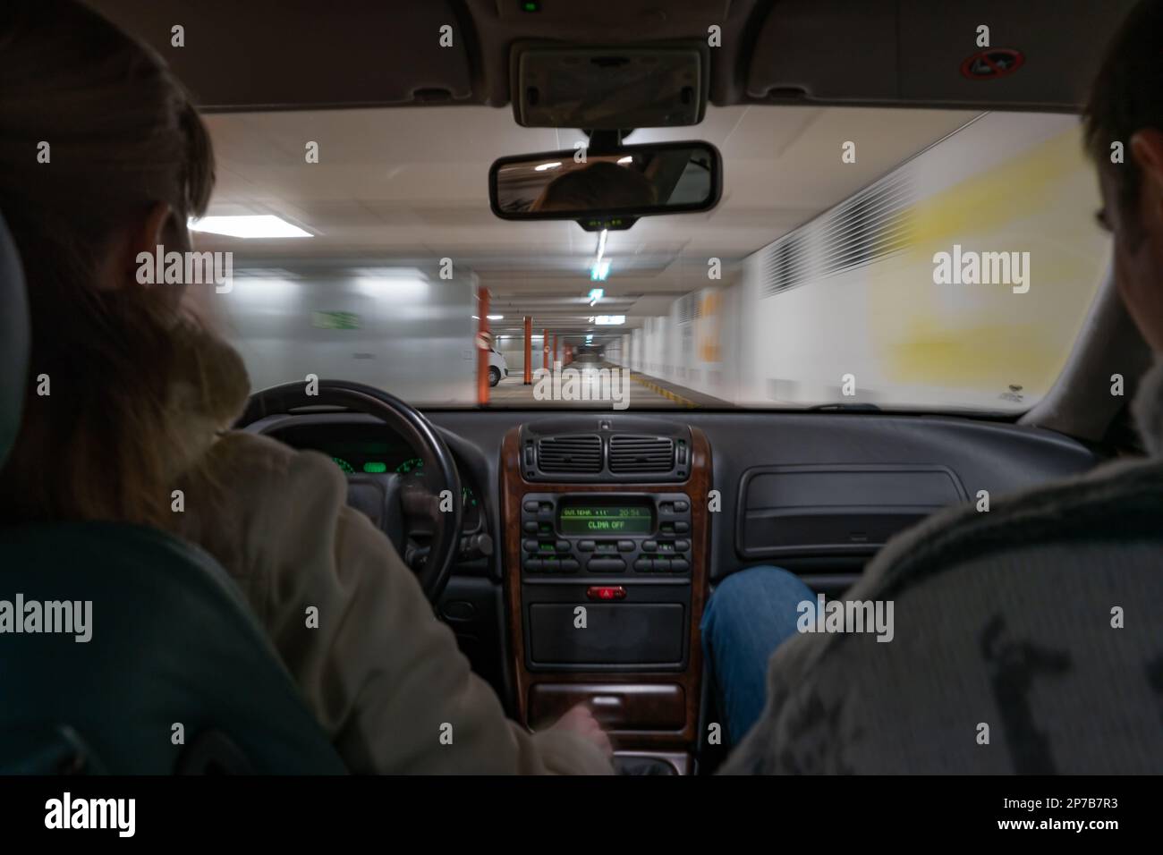 Car driving at night. Inside the car view, Caucasian female driver and ...