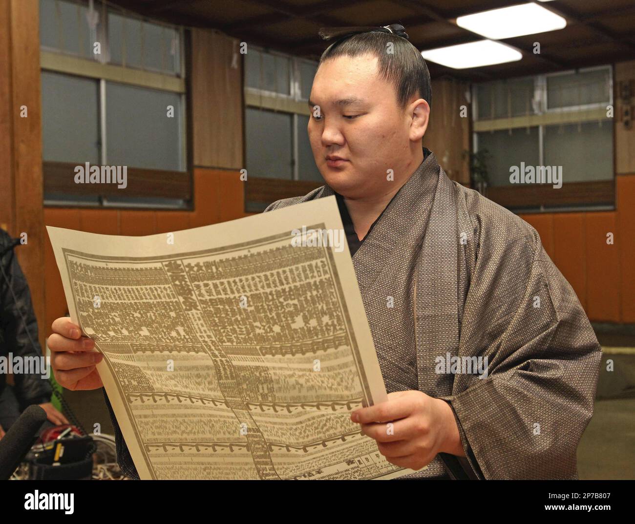 Yokozuna Hakuho takes a look at the ""banzuke'', an official list of ...