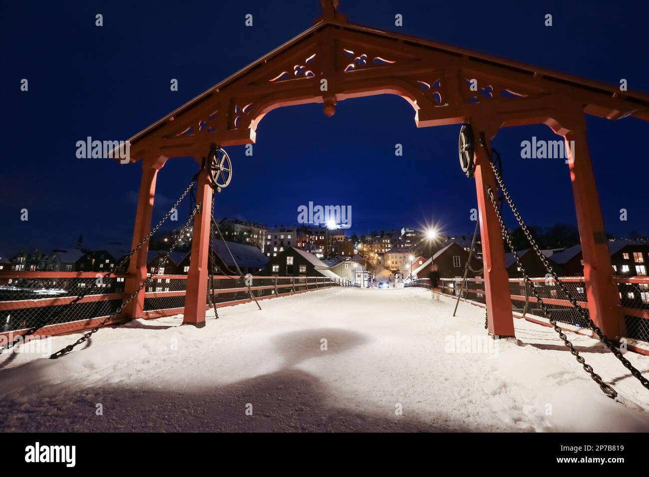 Twilight in Trondheim, spring snowfall, view of the Old Bridge ( den ...