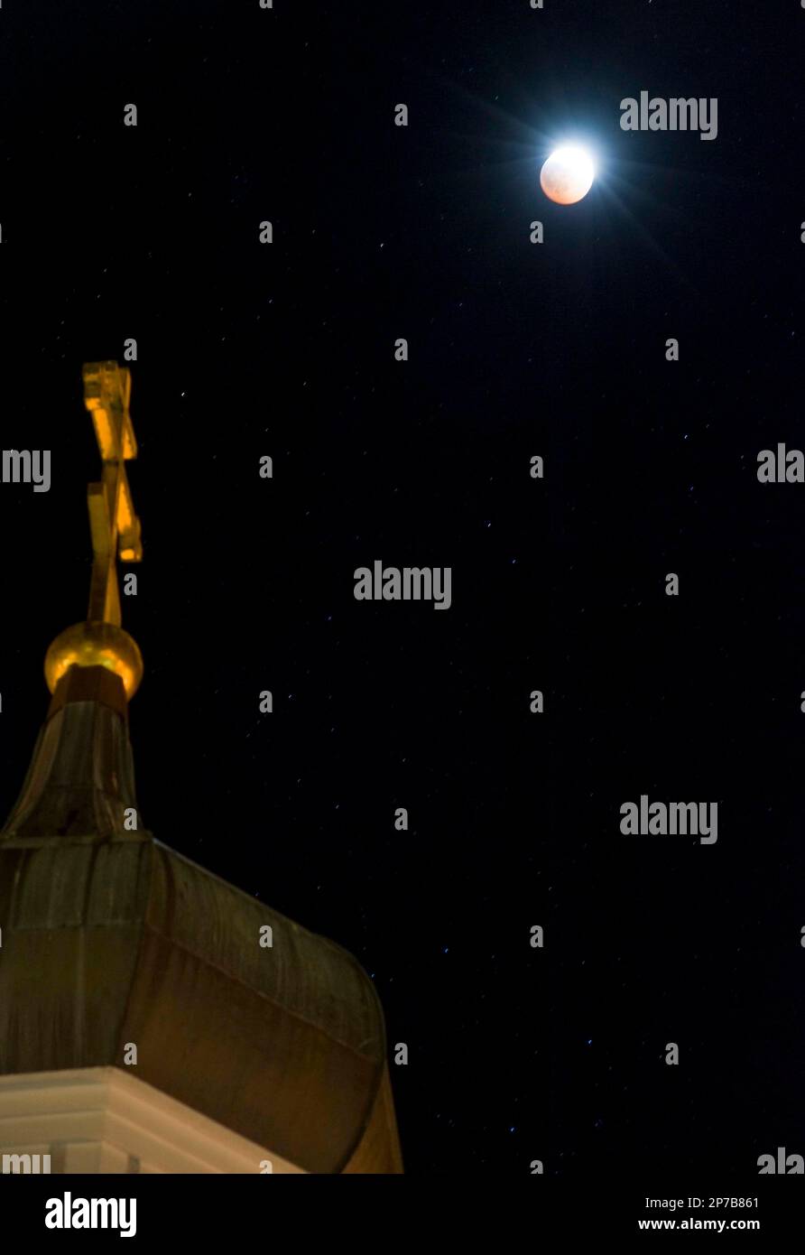 The moon enters an eclipse Monday, Dec. 20, 2010 as seen from St ...