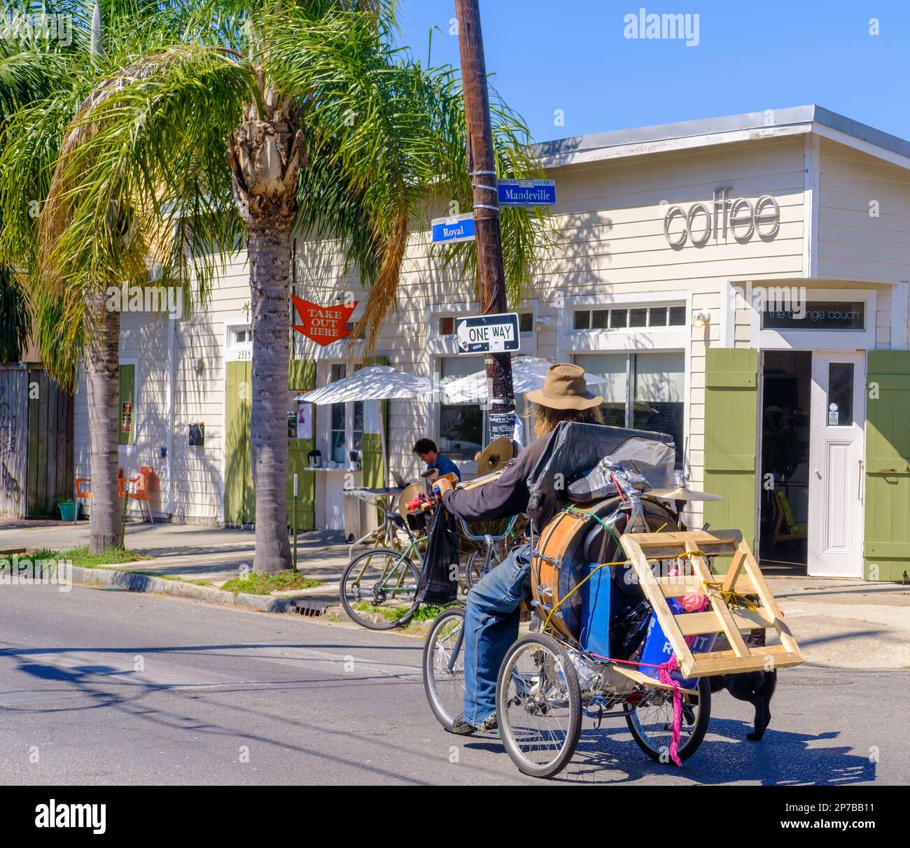 NEW ORLEANS, LA, USA - MARCH 5, 2023: Street drummer rides his loaded ...