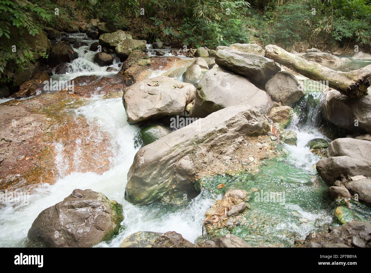 Peaceful shot of the hot spring of Malanage on Flores flowing down ...