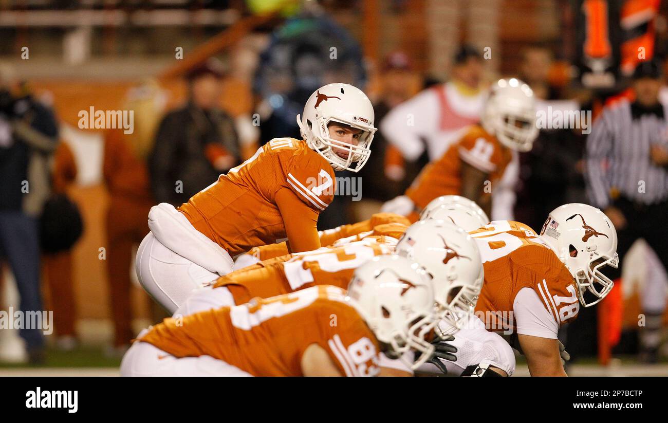 University of Texas Longhorns quarterback Garrett Gilbert (7) calls the ...
