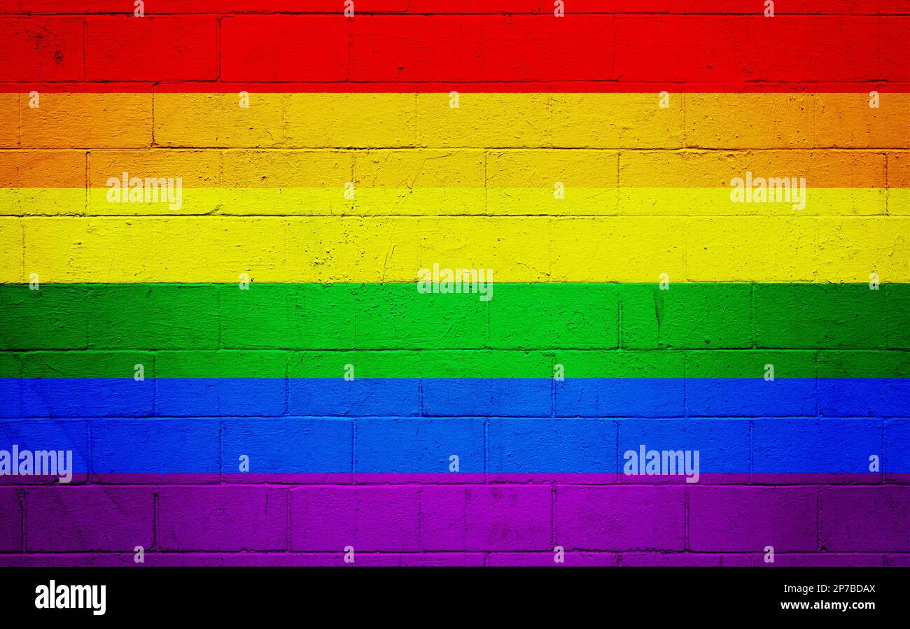 Picture of the Gay Flag painted on a cinder block wall Stock Photo - Alamy