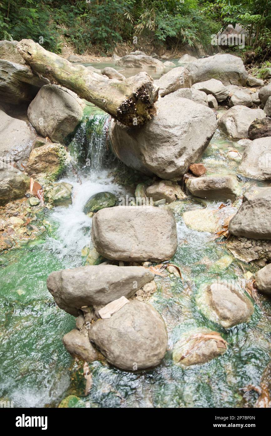 Peaceful shot of the hot spring of Malanage on Flores flowing down ...