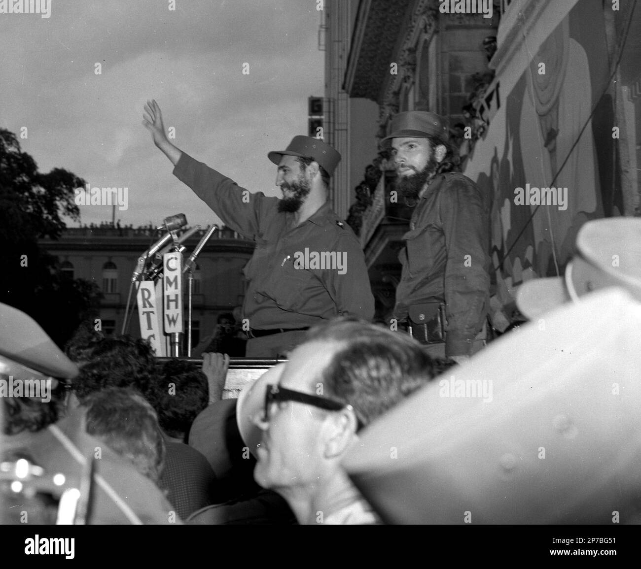 Cuban leader Fidel Castro waves to the crowd during a visit to Santa ...