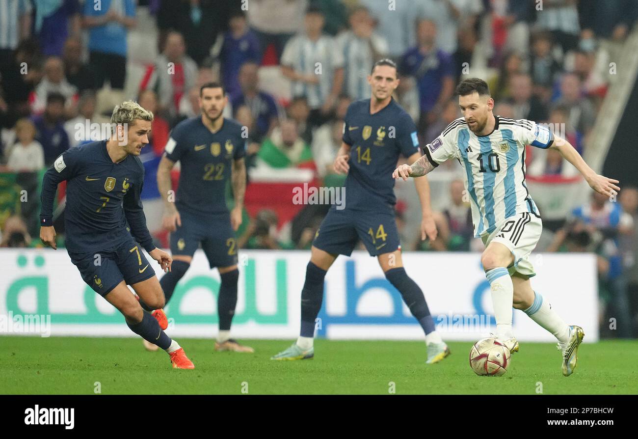Argentina's Lionel Messi runs at France's Antoine Griezmann during the ...