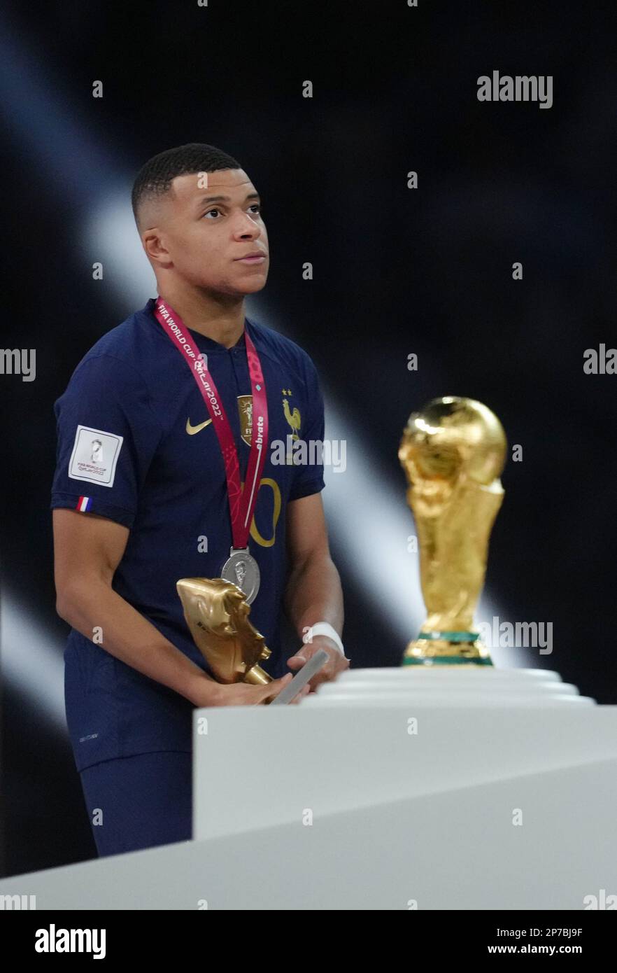 France's Kylian Mbappe shows his dejection as he walks past the World ...
