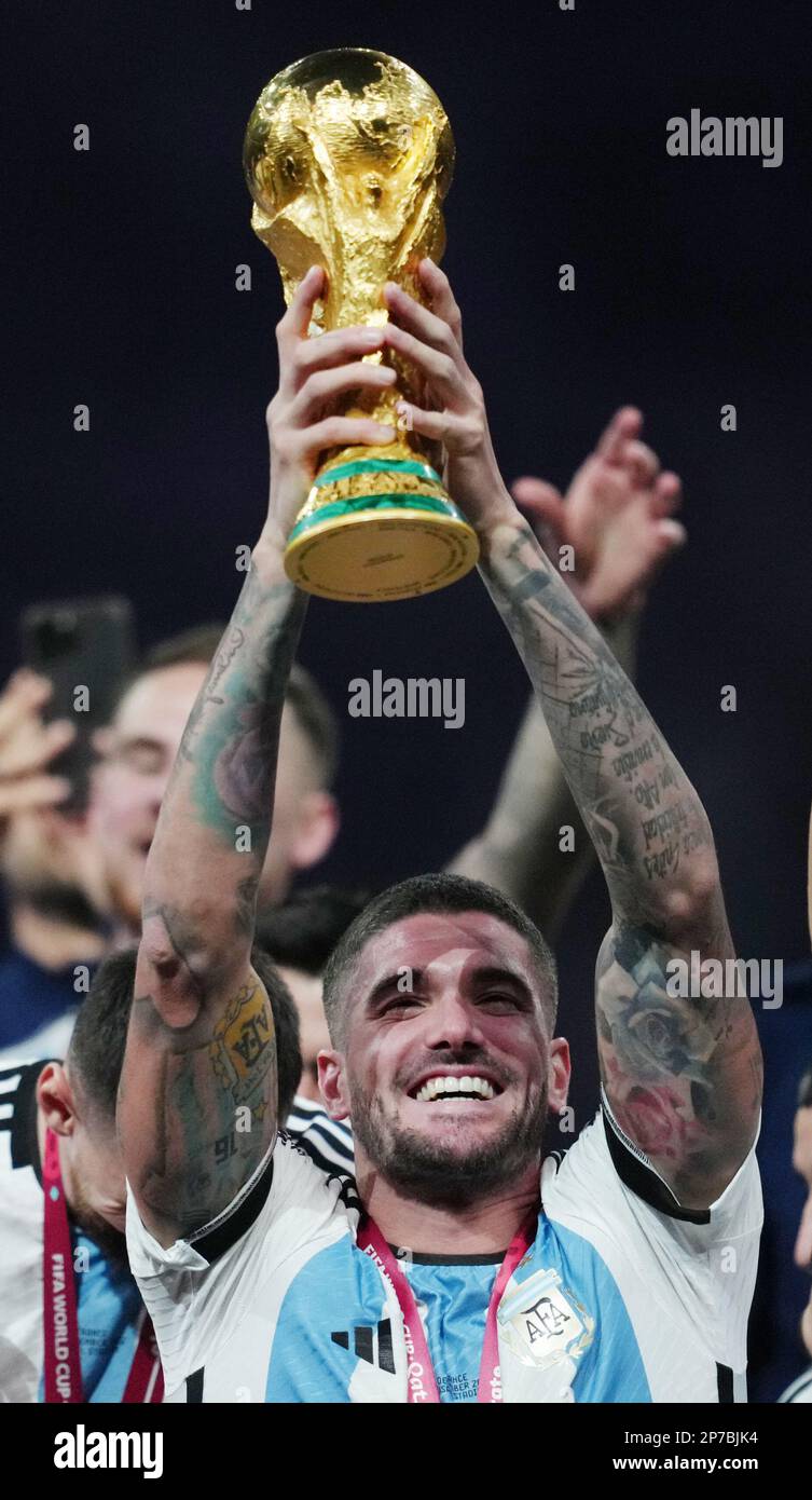 Argentina's Rodrigo De Paul lifts the World Cup Trophy during the FIFA ...