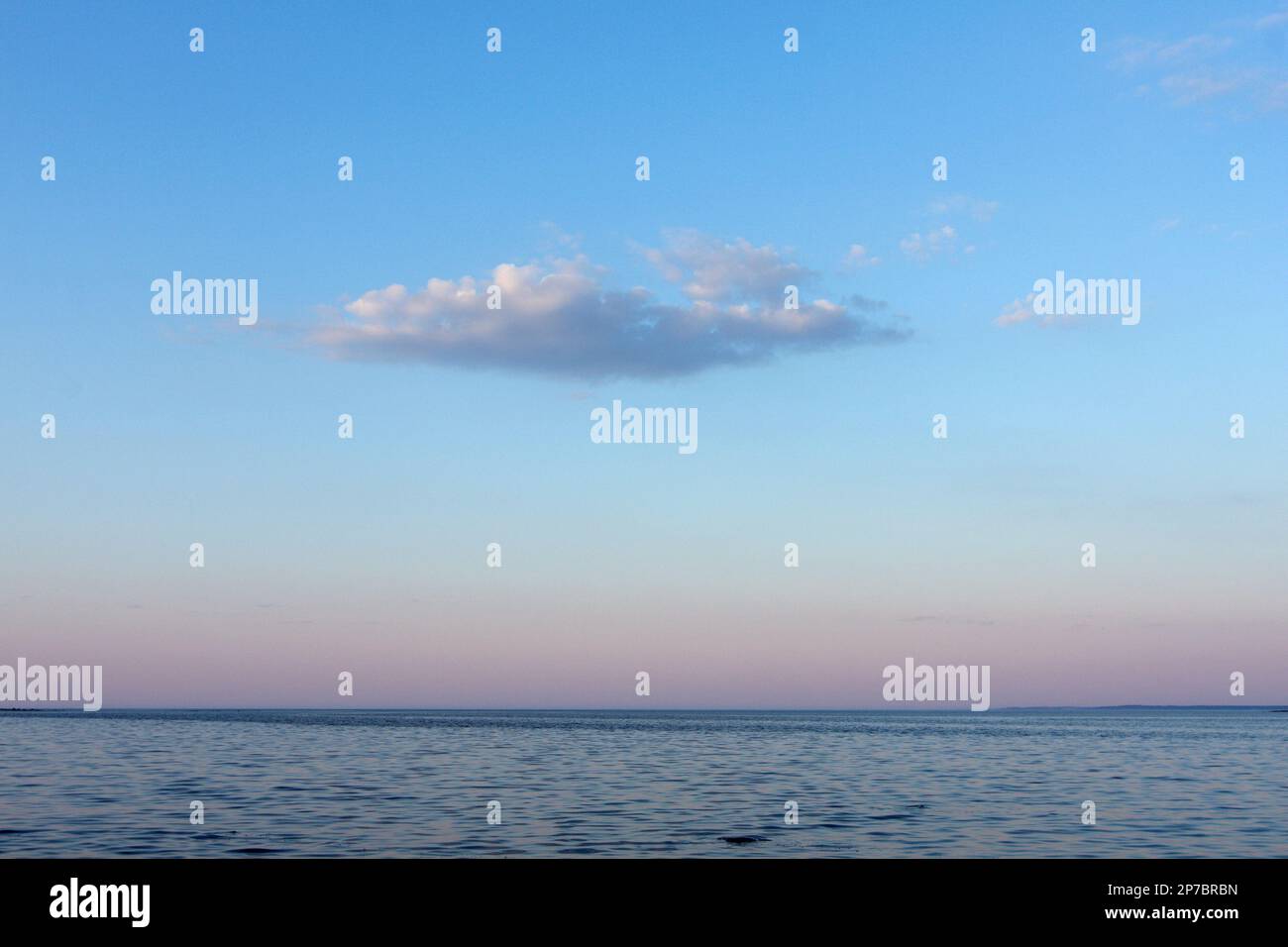 Once there were only one cloud in the sky. Sky in nightfall and ocean ...