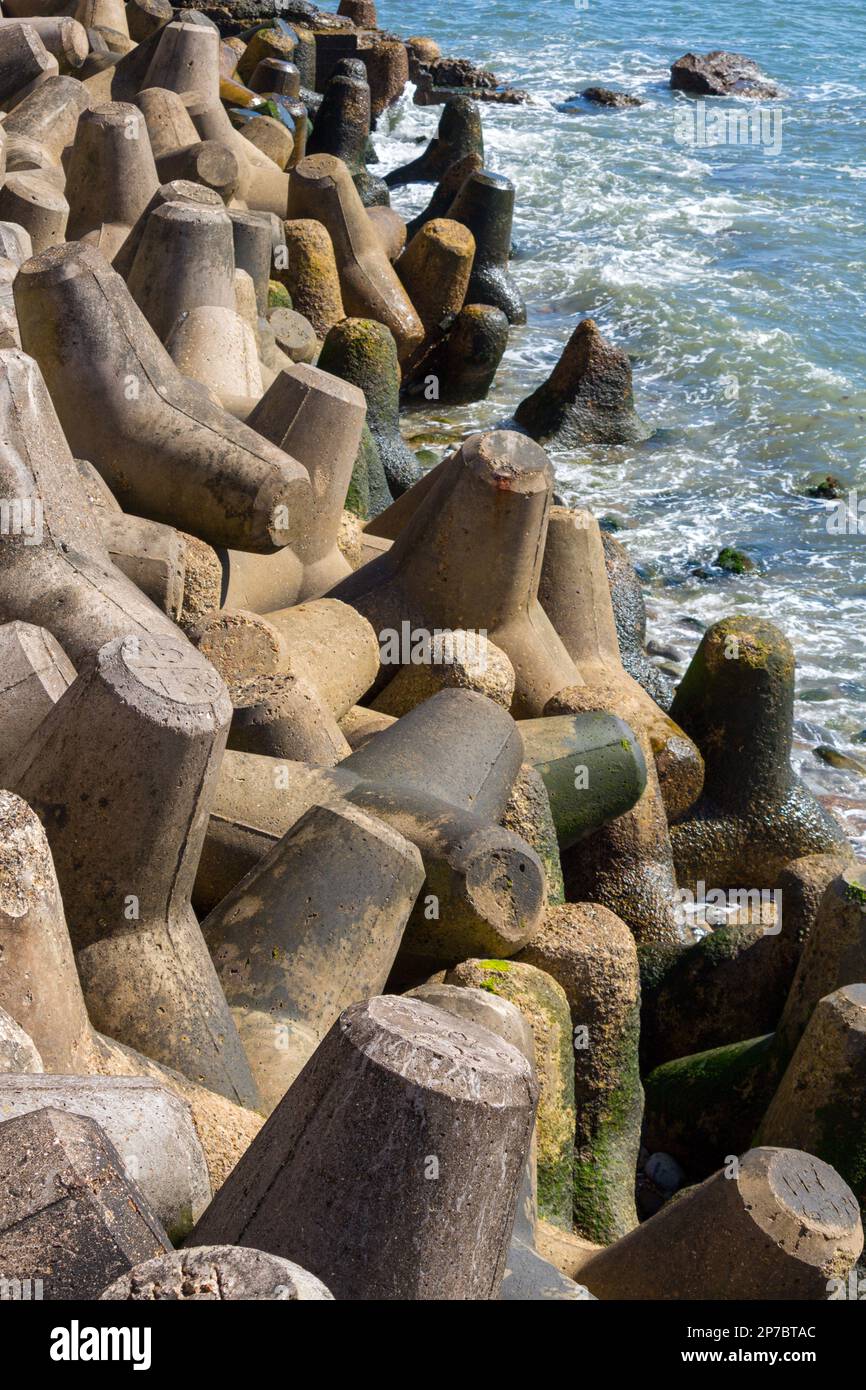 Tetrapod wave-dissipating concrete blocks, Isle of Wight, UK Stock ...