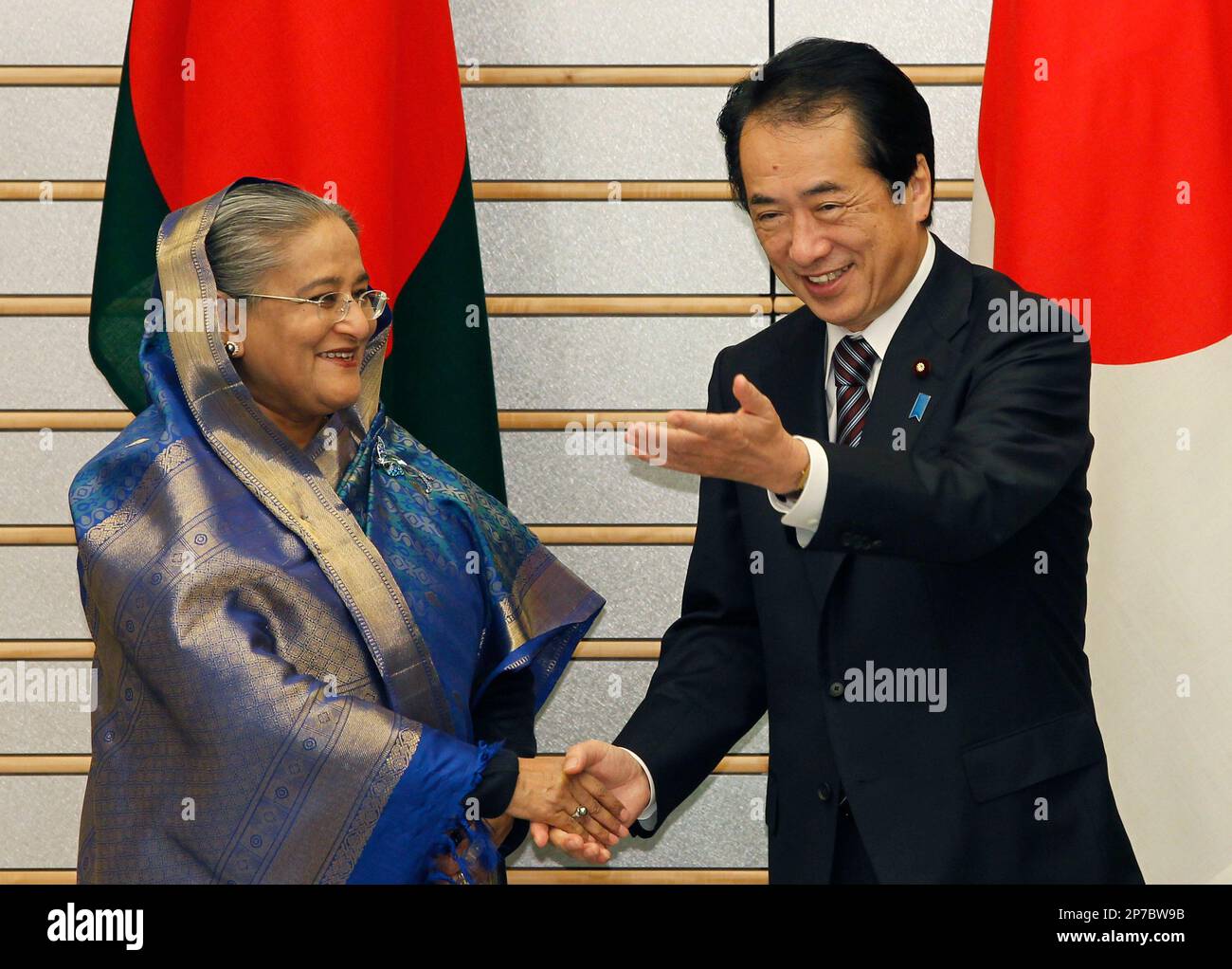 Bangladeshi Prime Minister Sheikh Hasina, left, is greeted by Japanese ...