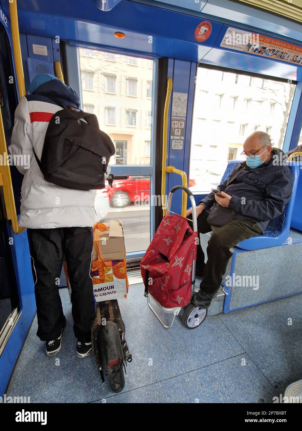 Passengers in a tram train, Lyon, France Stock Photo - Alamy