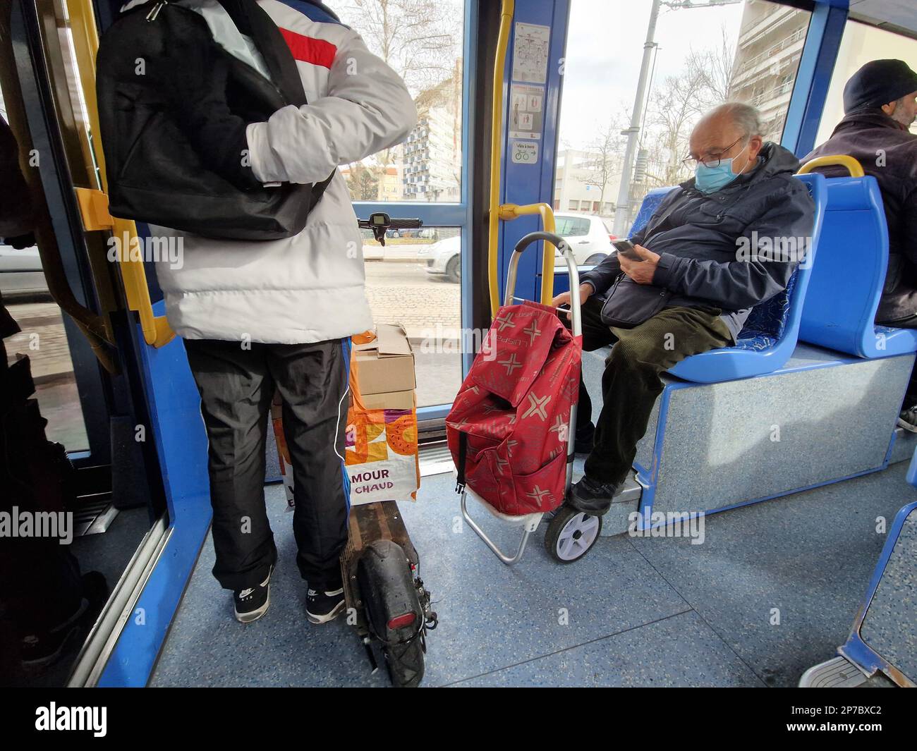 Passengers in a tram train, Lyon, France Stock Photo - Alamy