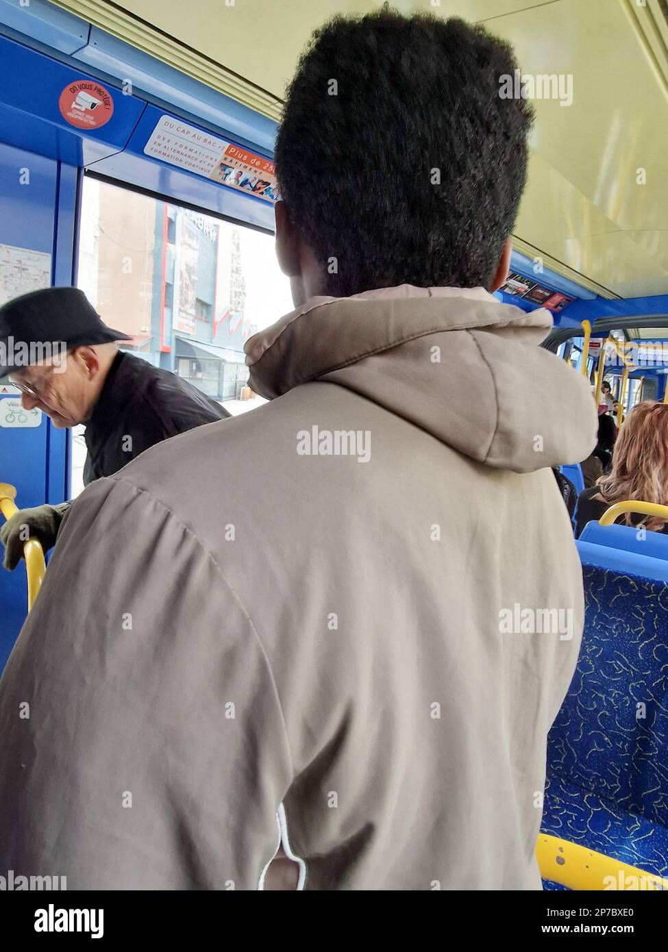Passengers in a tram train, Lyon, France Stock Photo - Alamy