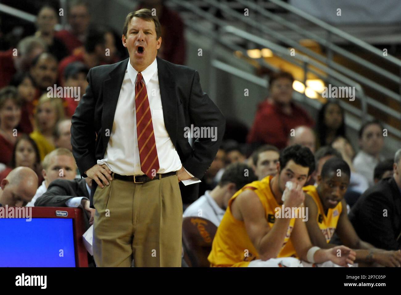 University of Southern California head coach Tim Floyd communicates to ...