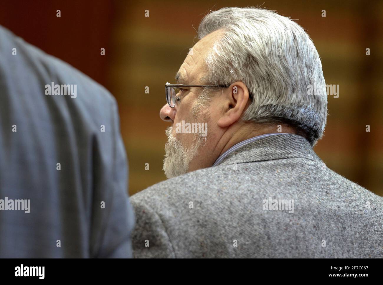 Bruce Turnidge stands as the jury arrives in the courtroom as his son ...