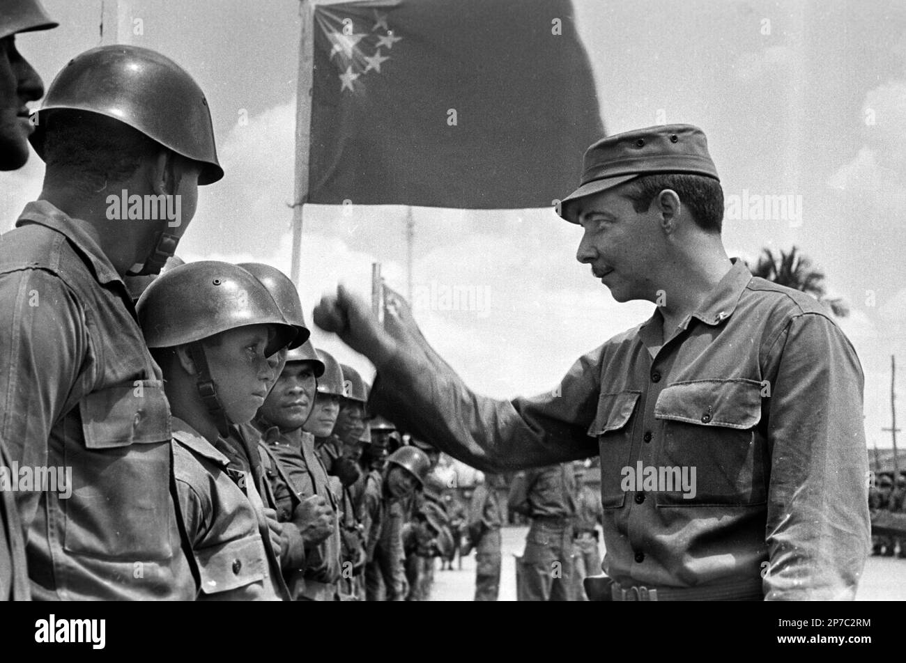 Cuban Army General Raul Castro, right, speaks with soldiers during a ...