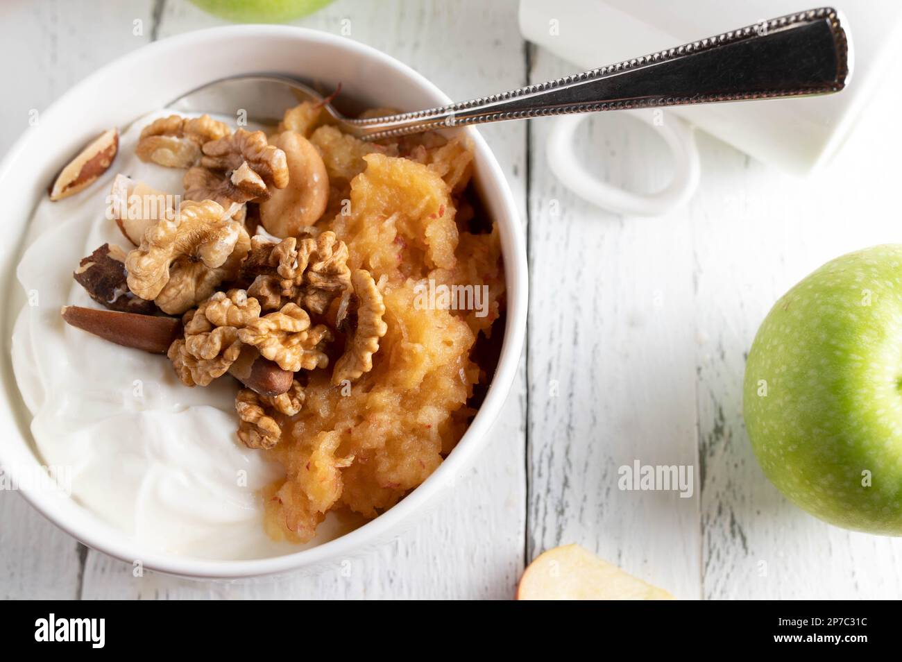 Low carb protein breakfast with islandic skyr, grated apples and nuts ...