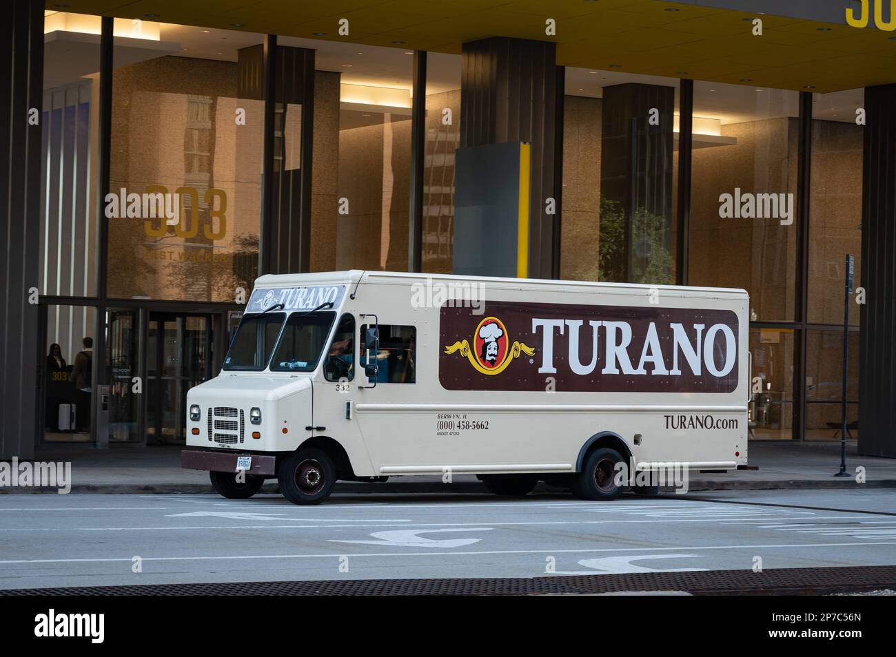White delivery truck of Turano bakery parked outside a large commercial ...