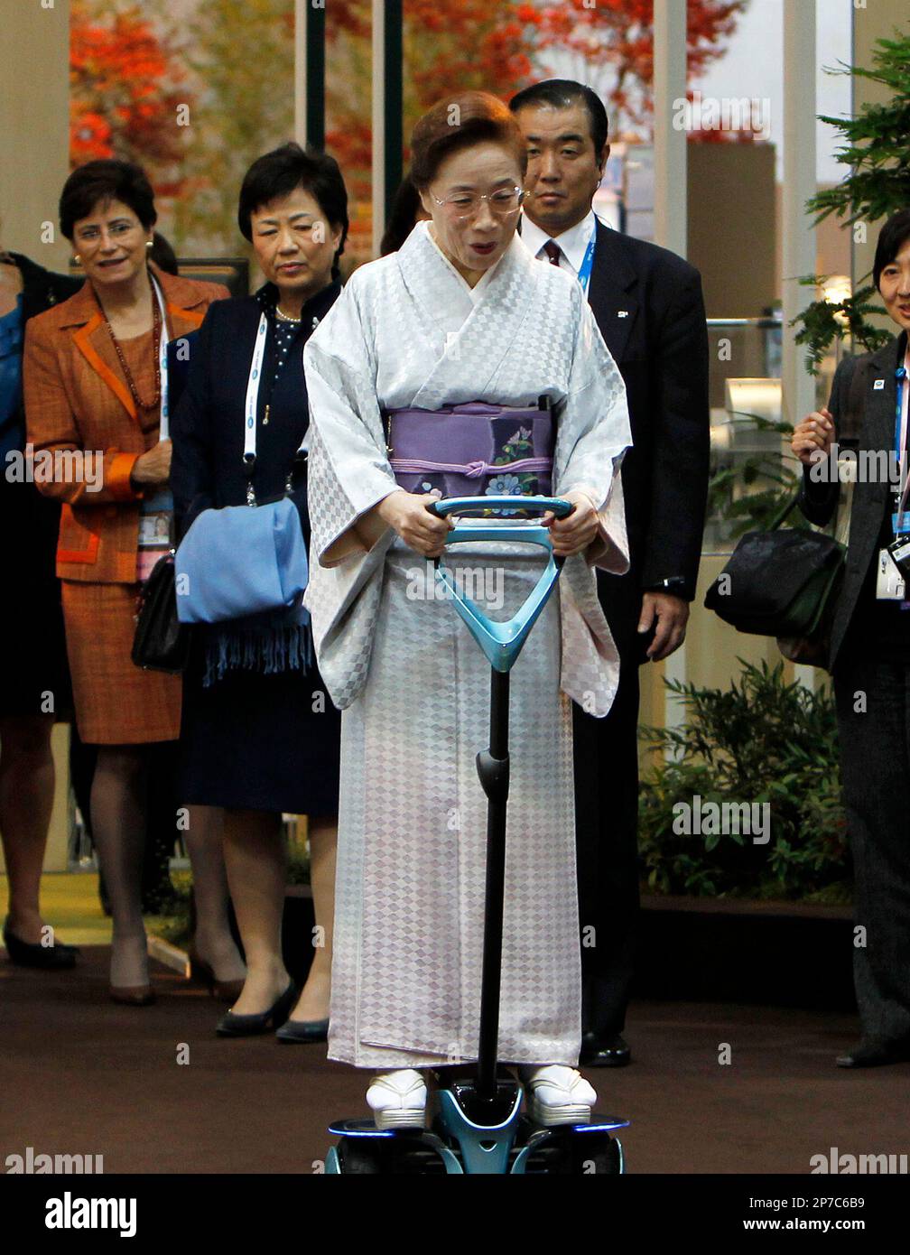 Nobuko Kan, wife of Japanese Prime Minister Naoto Kan, rides Toyota's ...