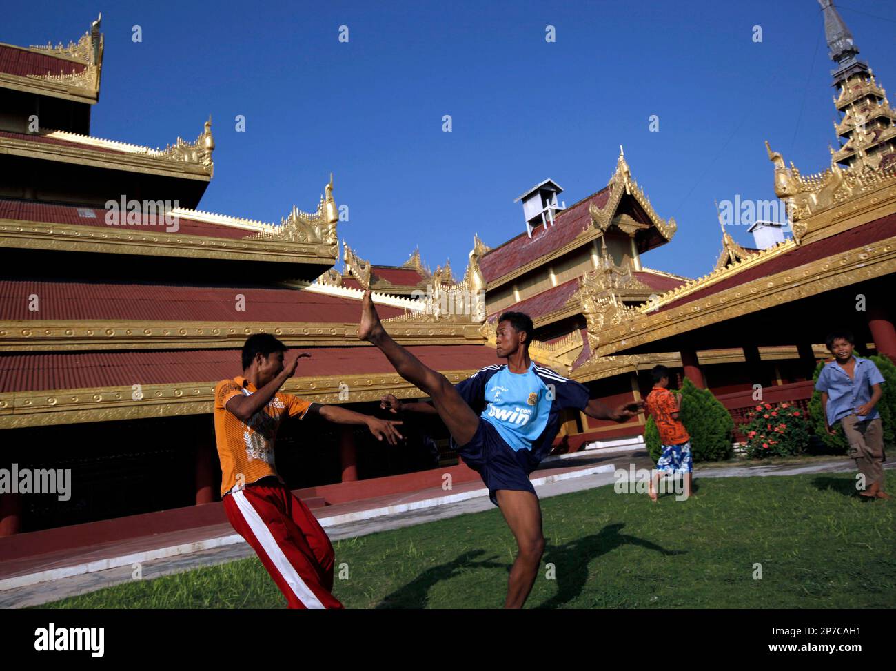 In this photo taken on Nov. 5, 2010, Myanmar men practice martial arts ...