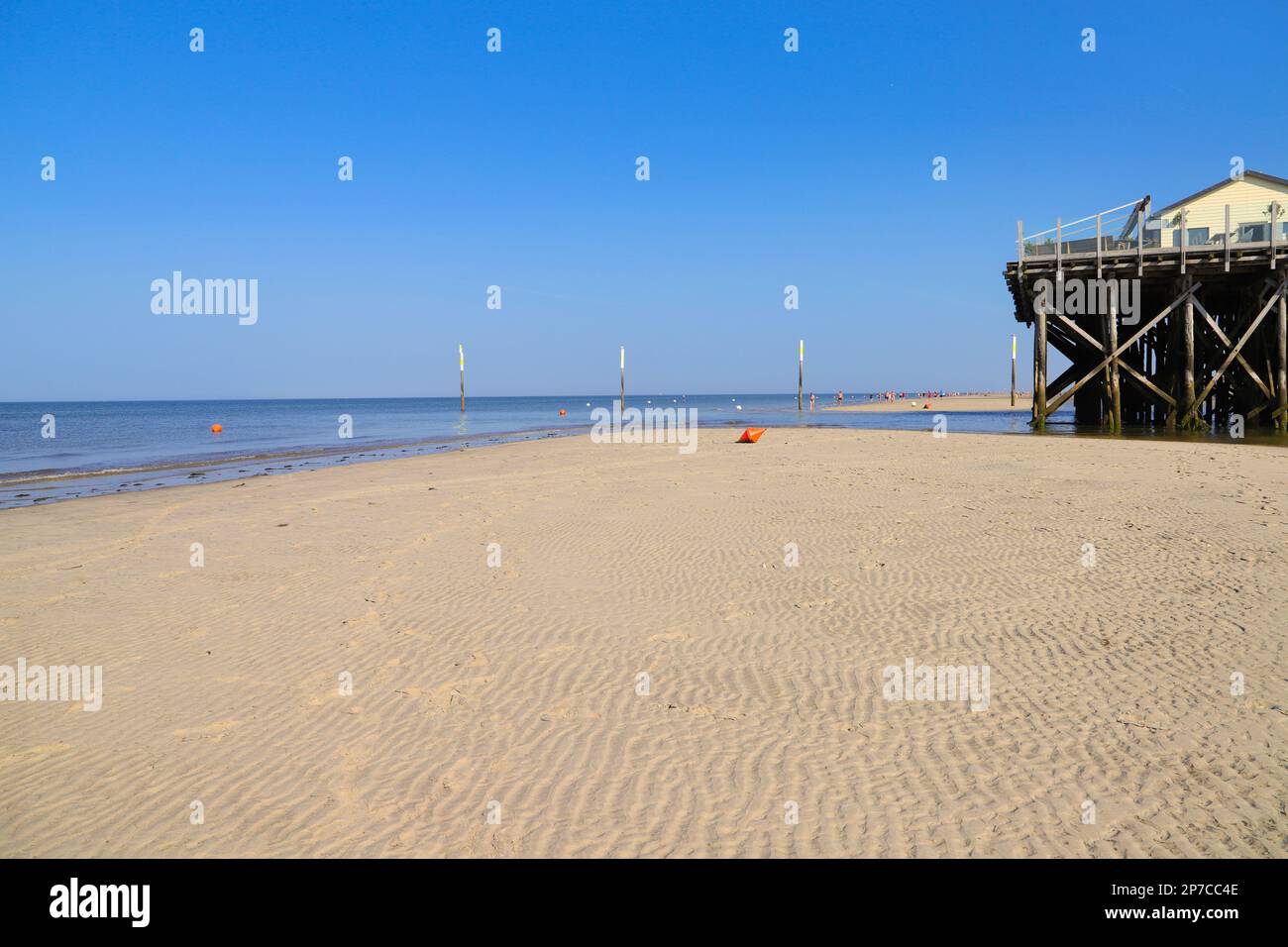 View at the wide sand beach at low tide of St. Peter Ording, North Sea ...
