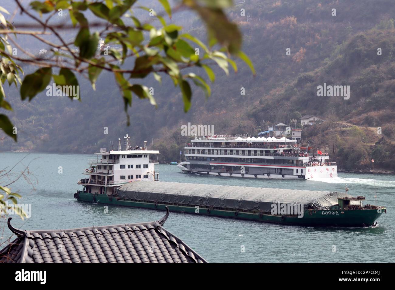 YICHANG, CHINA - MARCH 8, 2023 - Freight and cruise ships sail in the ...