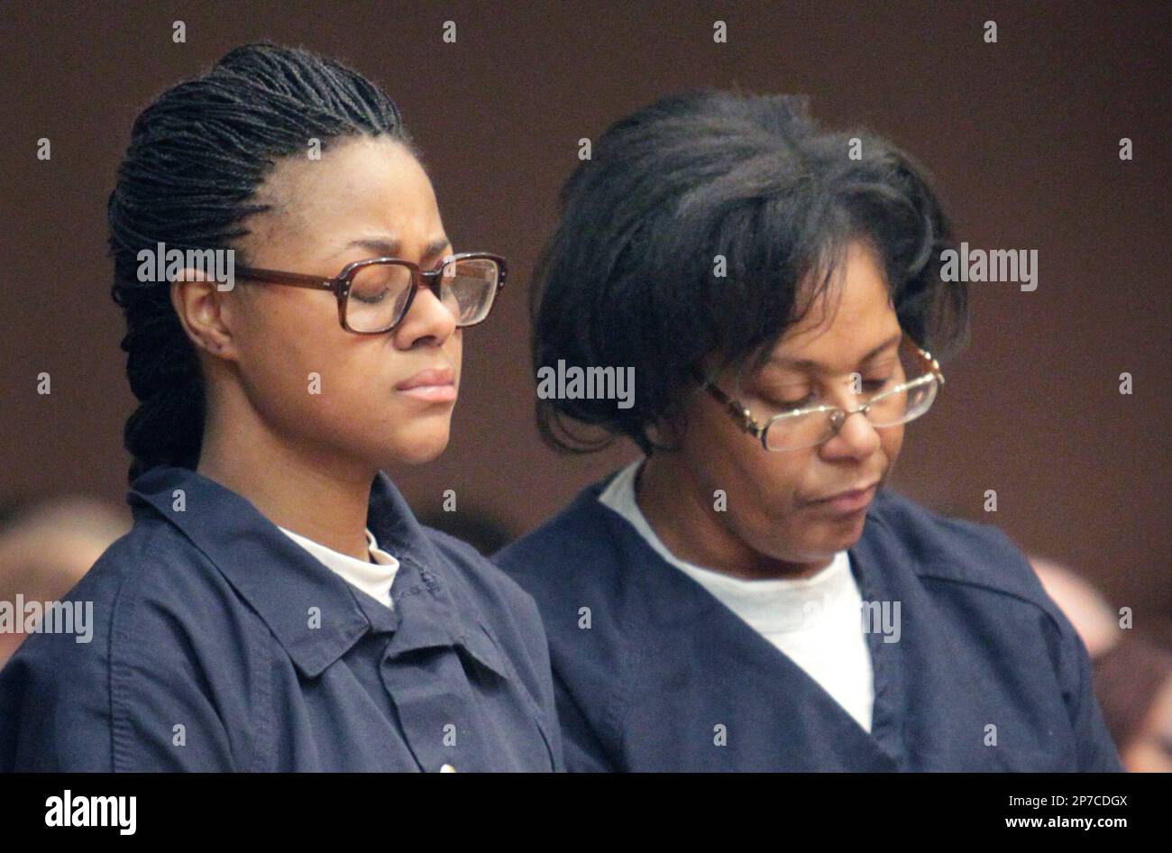 Aimee Michael, left, and her mother Sheila Michael stand react being ...
