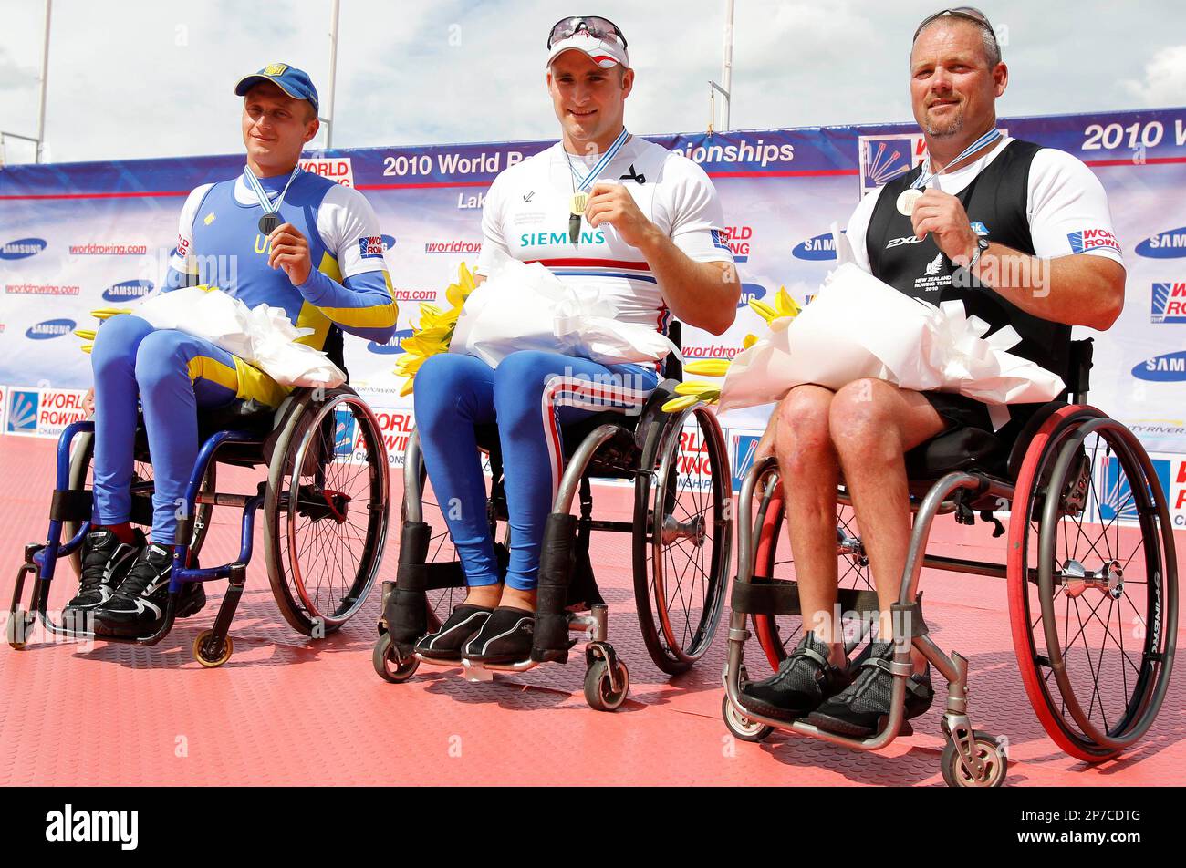 From left: Ukraine's Andrii Kryvchun, silver medal, Great Britain's Tom ...
