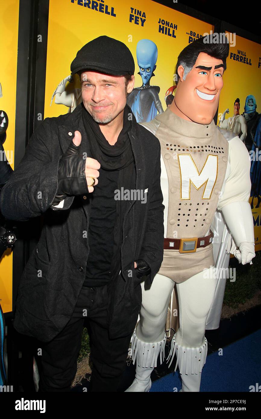 In this photo released by Starpix, actor Brad Pitt poses with an ...