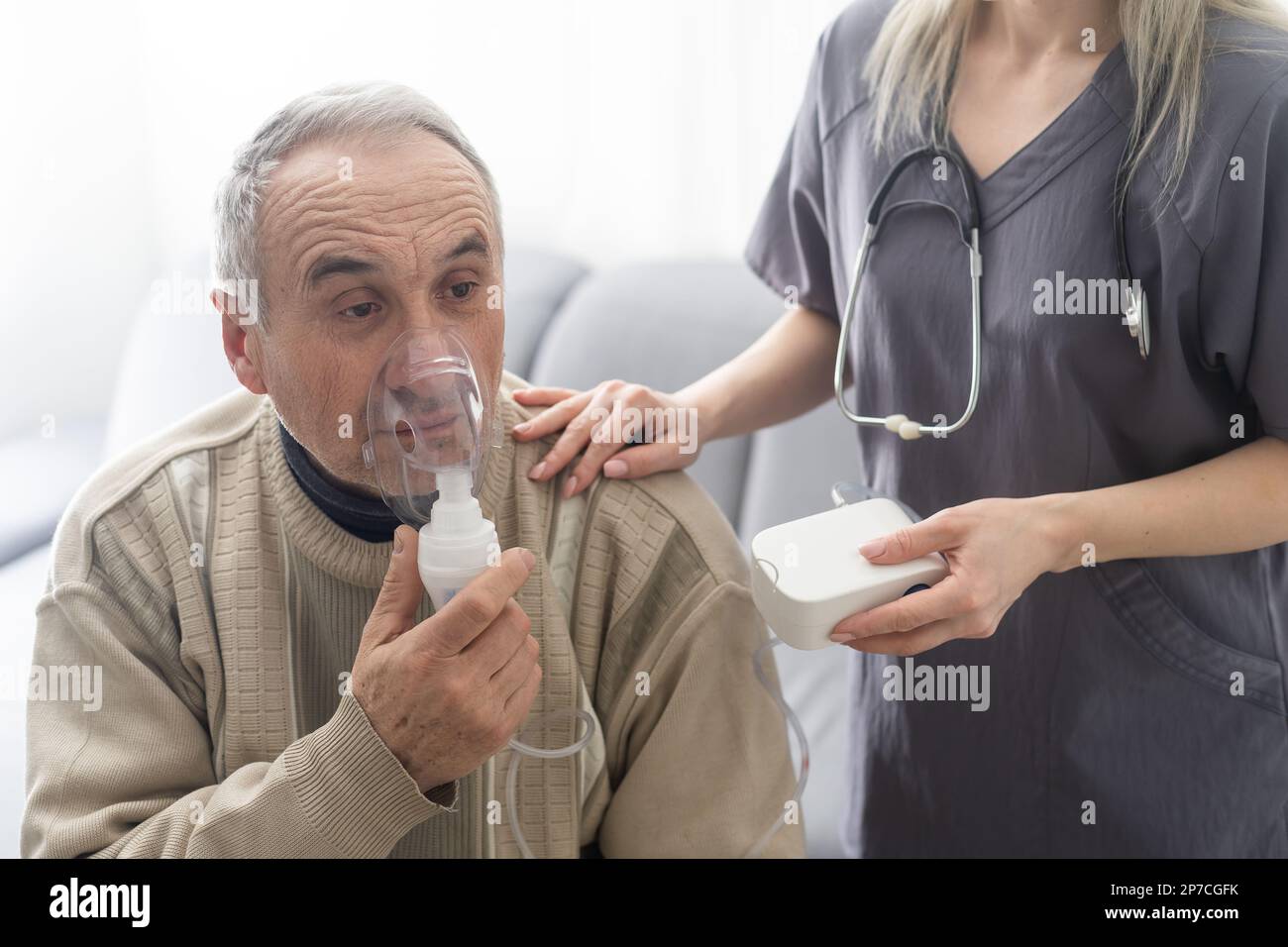 Sick elderly man makes inhalation Stock Photo - Alamy