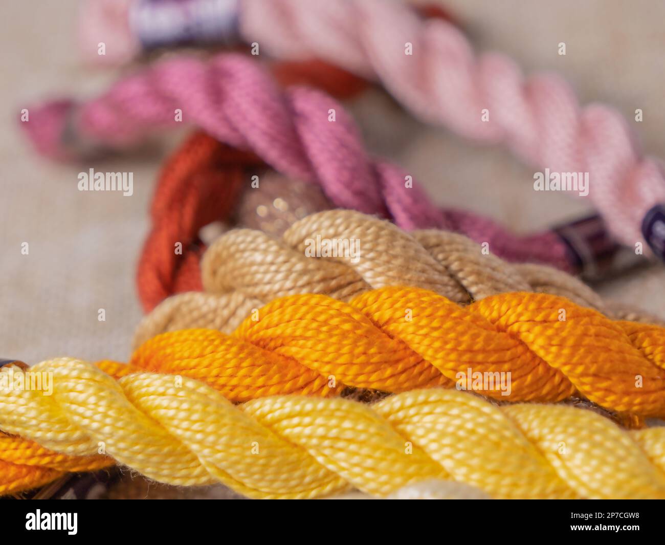 Multi-colored threads for embroidery, knitting, close-up, handmade ...