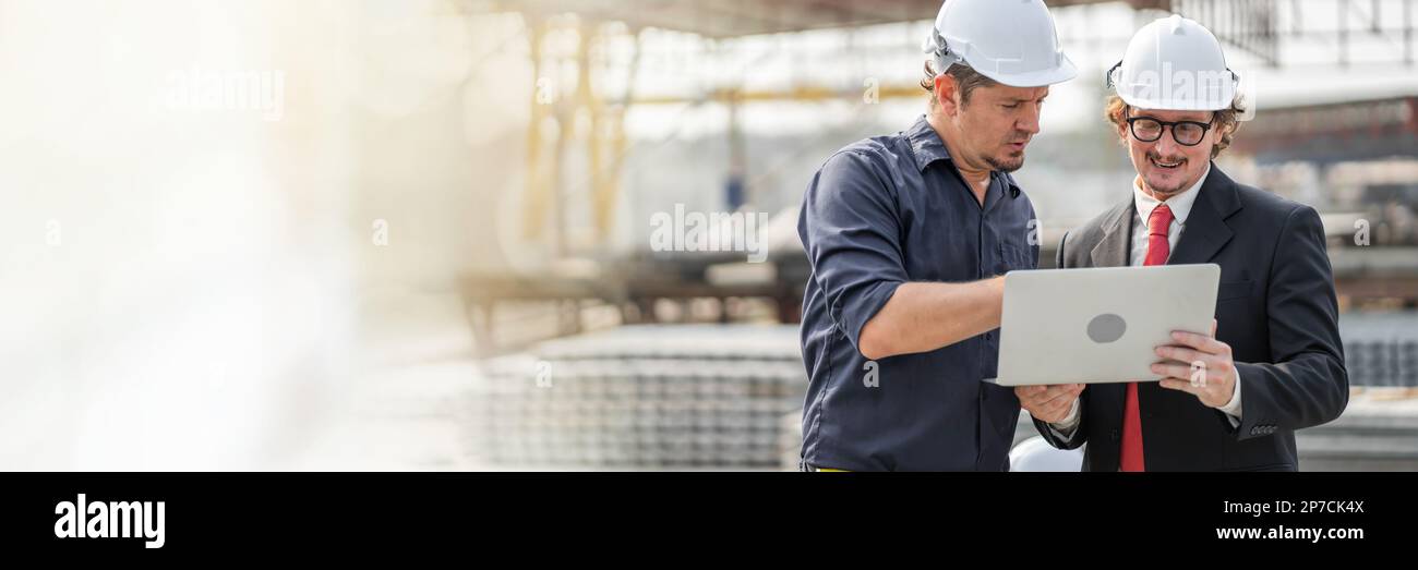 Web banner Male engineers inspecting and controlling the work of the ...