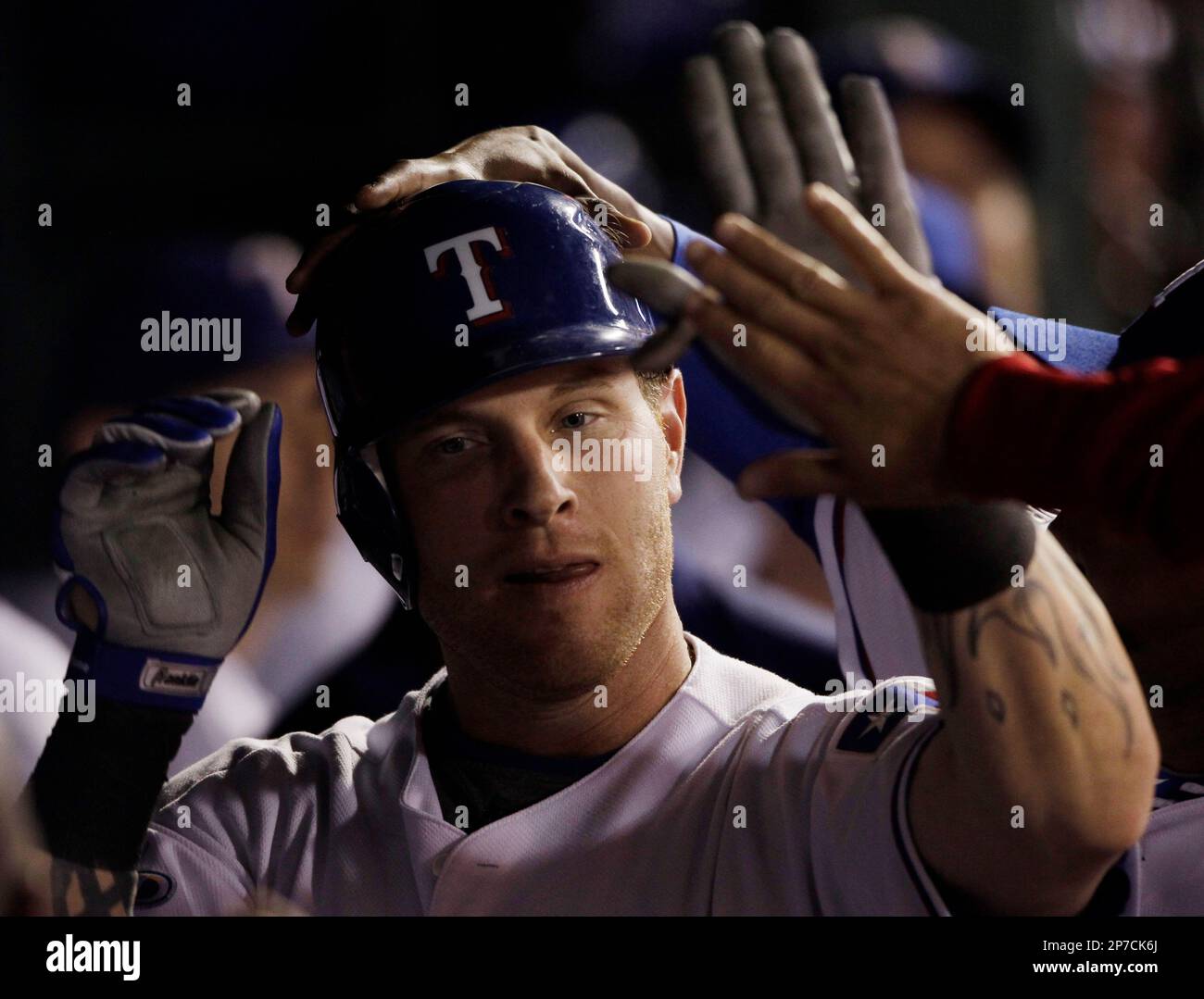 Texas Rangers' Josh Hamilton is congratulated by teammates after ...