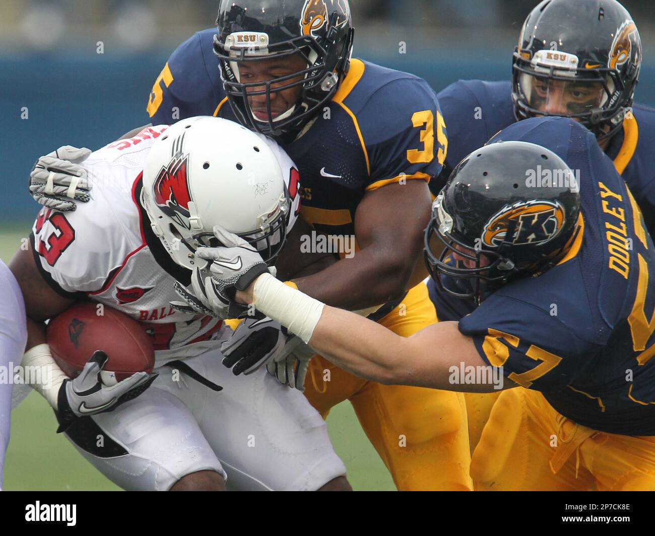 Ball State's MiQuale Lewis (left) is taken down by Kent State's Dorian ...