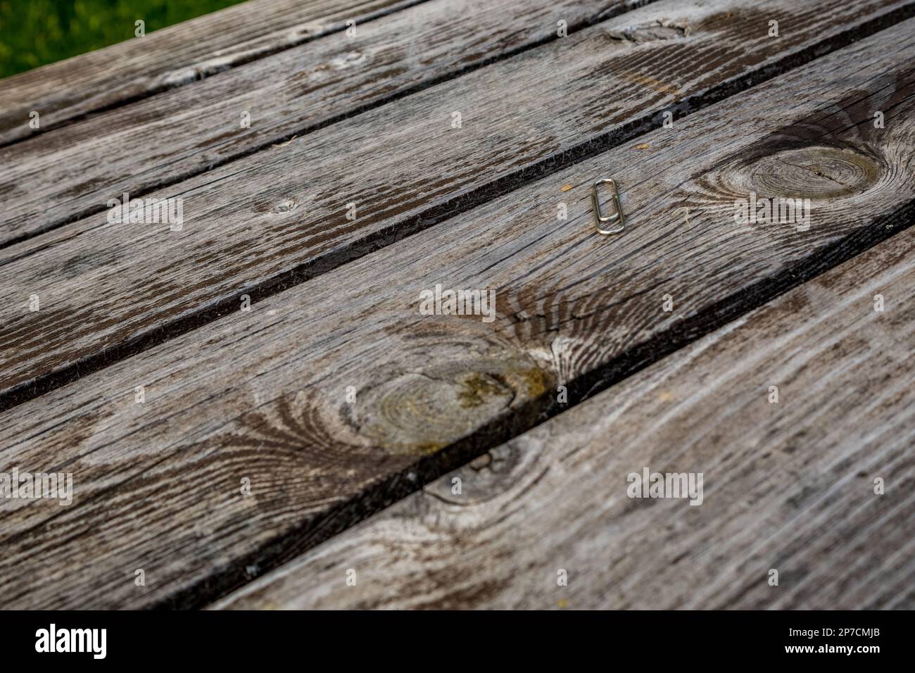 Wooden table old wood texture close up with forgotten metallic ...